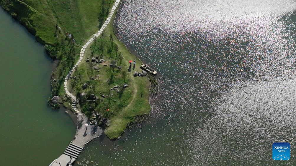 Tourists visit Dongjiang Lake scenic spot in Hunan-Xinhua