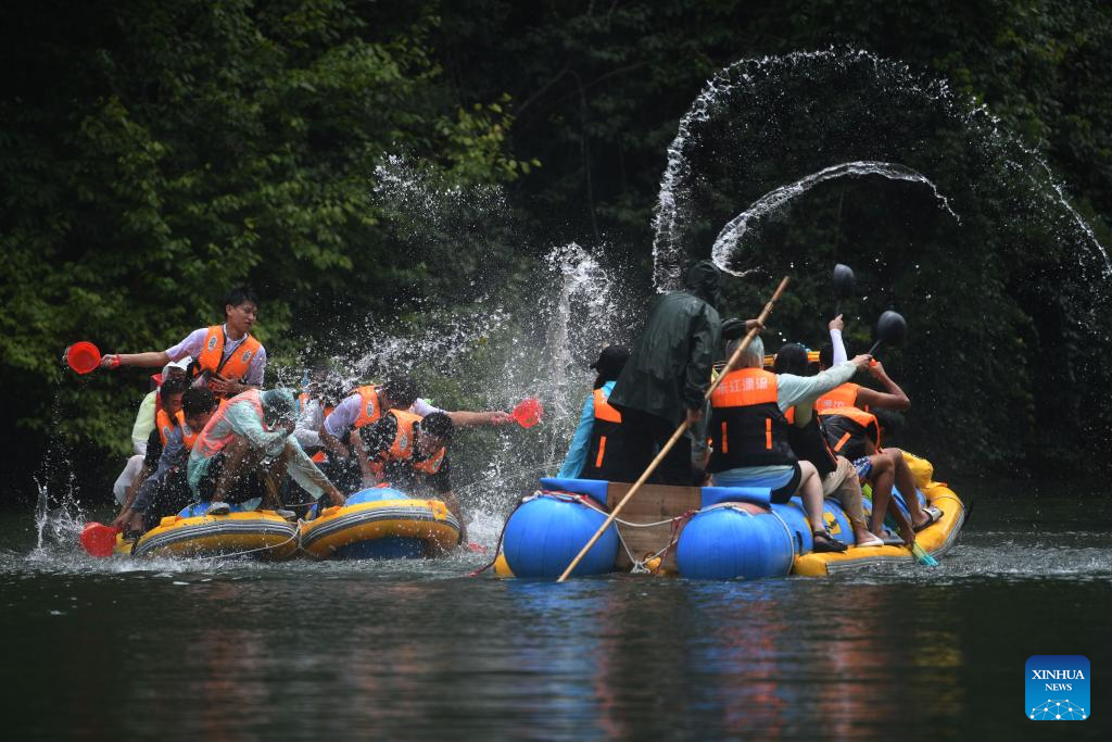 Tourists visit Dongjiang Lake scenic spot in Hunan-Xinhua