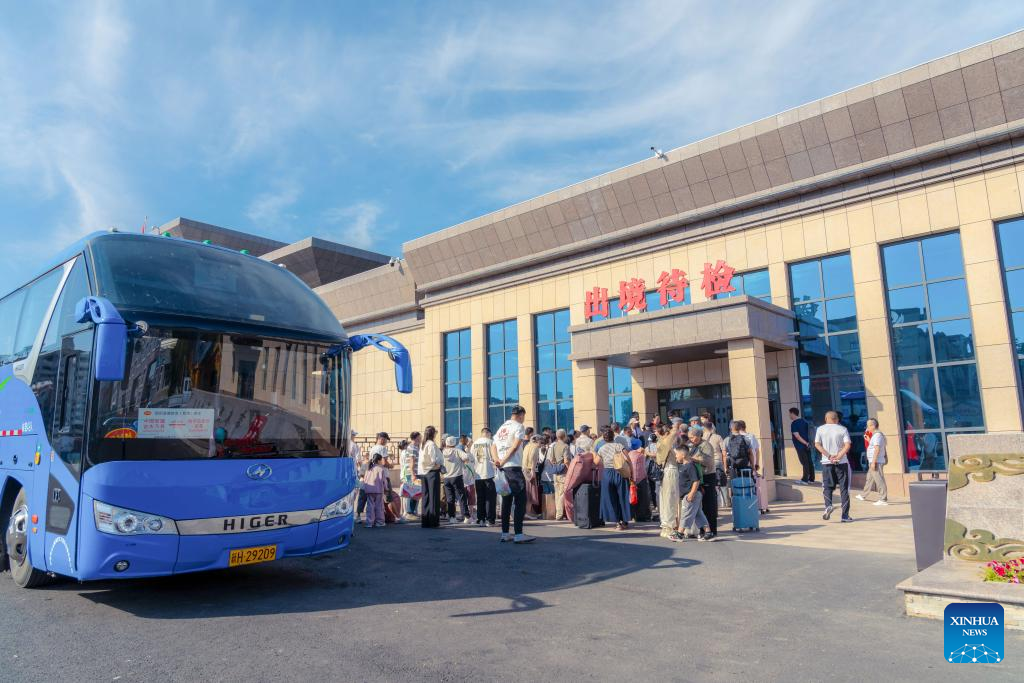 Economic Watch: China-Kazakhstan port sees surging cross-border tourism ...