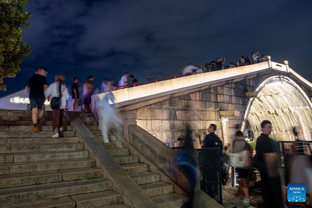 Ancient canal in China's Wuxi attracts more visitors with modern tech ...