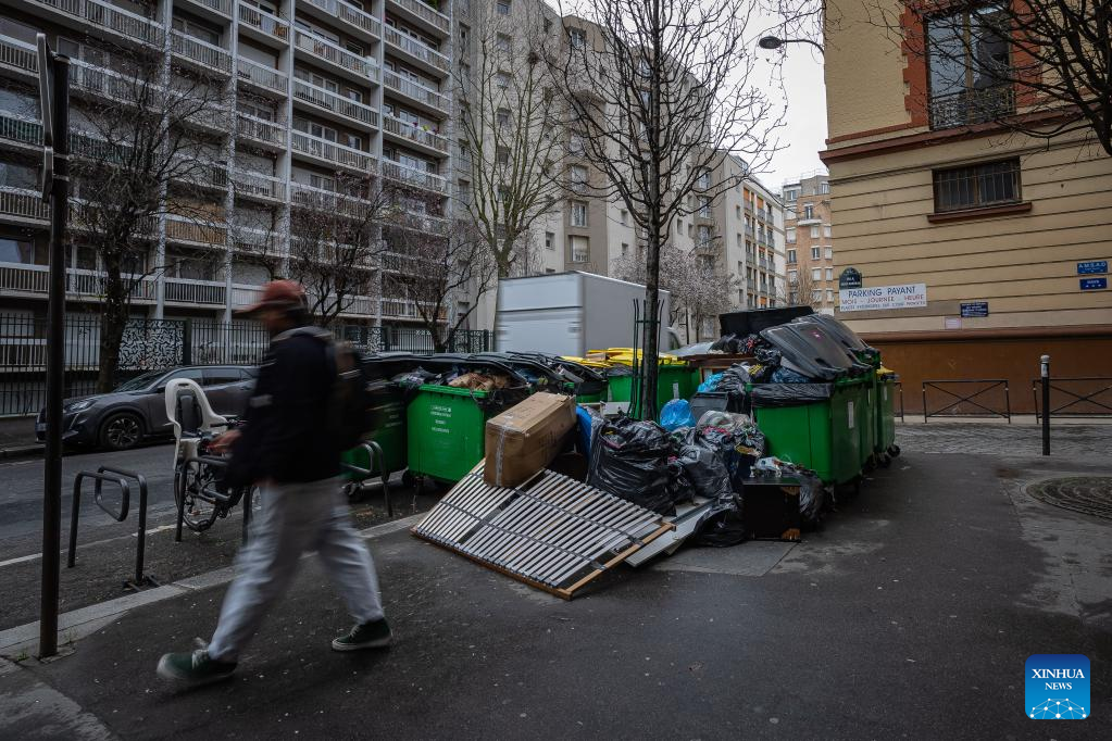 Garbage piles up on streets after demonstration in Paris, France-Xinhua