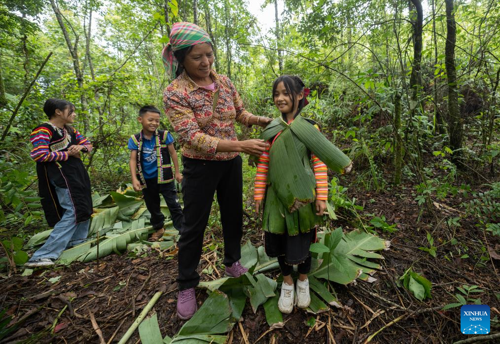 Pic story: revisit to Kucong people's primitive life-Xinhua