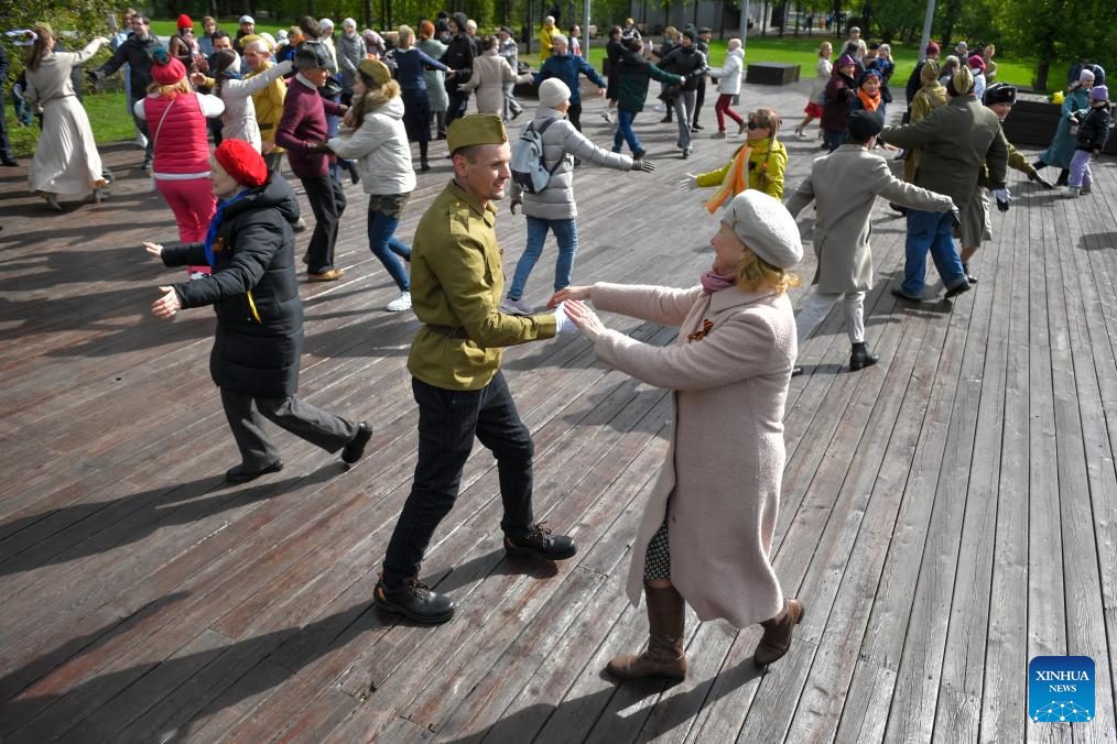 People dance during celebration of Victory Day in Moscow, Russia-Xinhua