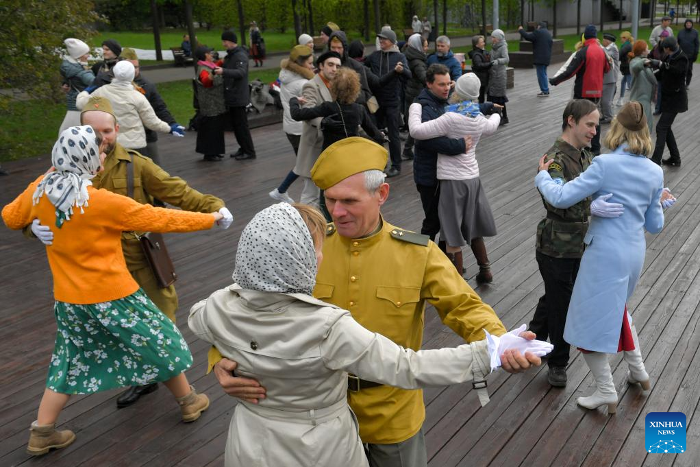 People dance during celebration of Victory Day in Moscow, Russia-Xinhua