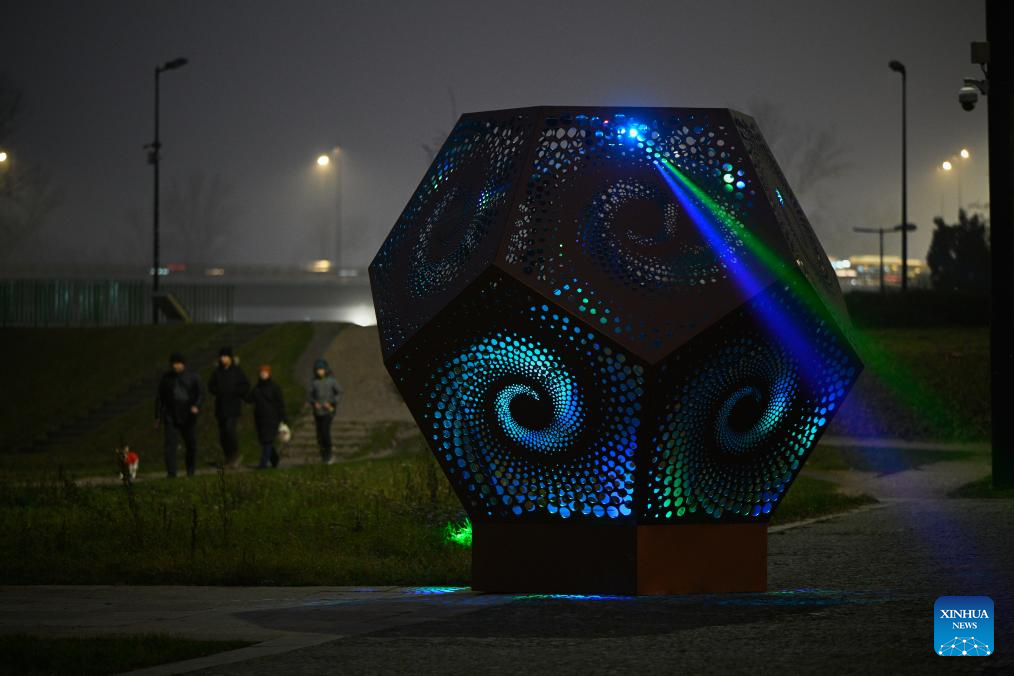 Lantern sculptures seen along Vistula River banks in Warsaw, Poland-Xinhua